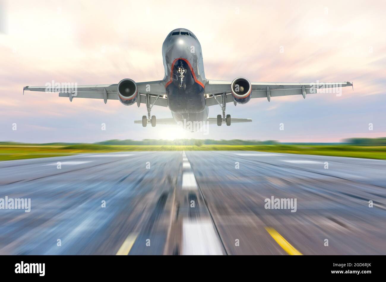 Aircraft speed on the landing runway at dawn Stock Photo - Alamy