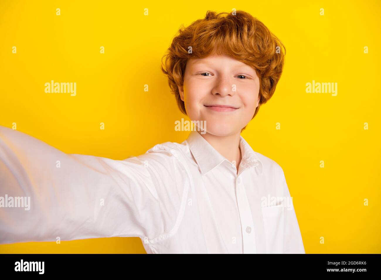 Portrait of young handsome good-looking smiling boy take selfie smart ...