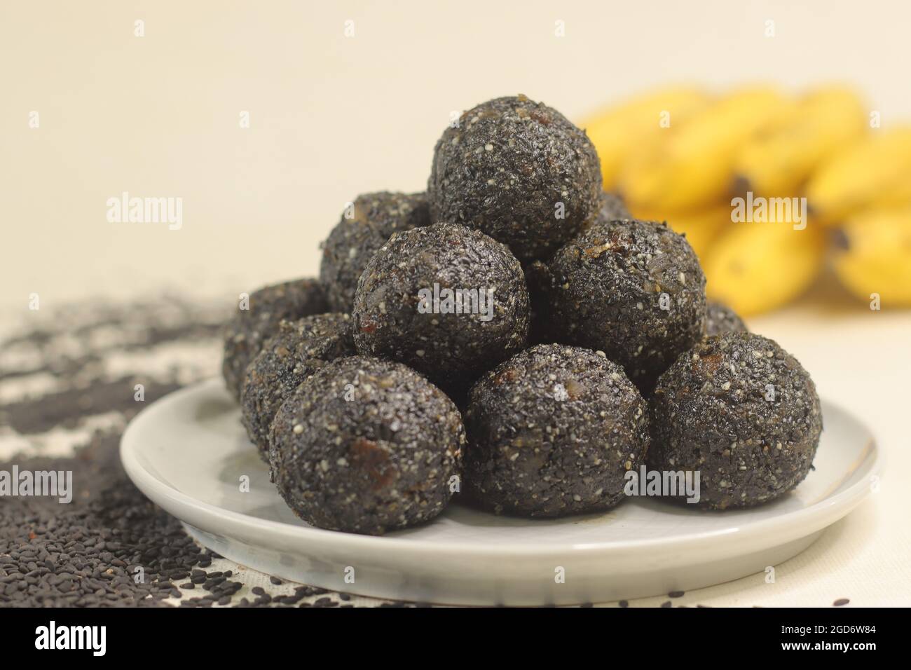 Traditional Indian sweet balls made with sesame seeds, jaggery and ...