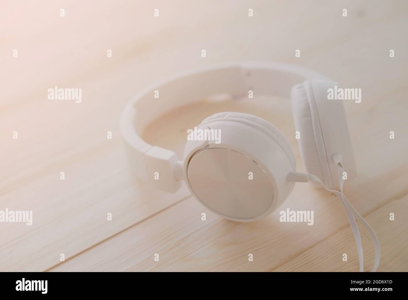 Headphones on the table. Relax concept Stock Photo - Alamy