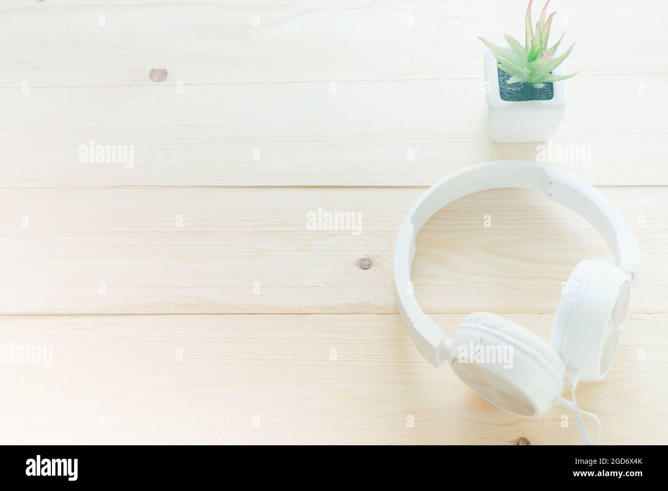 Headphones on the table. Relax concept Stock Photo - Alamy