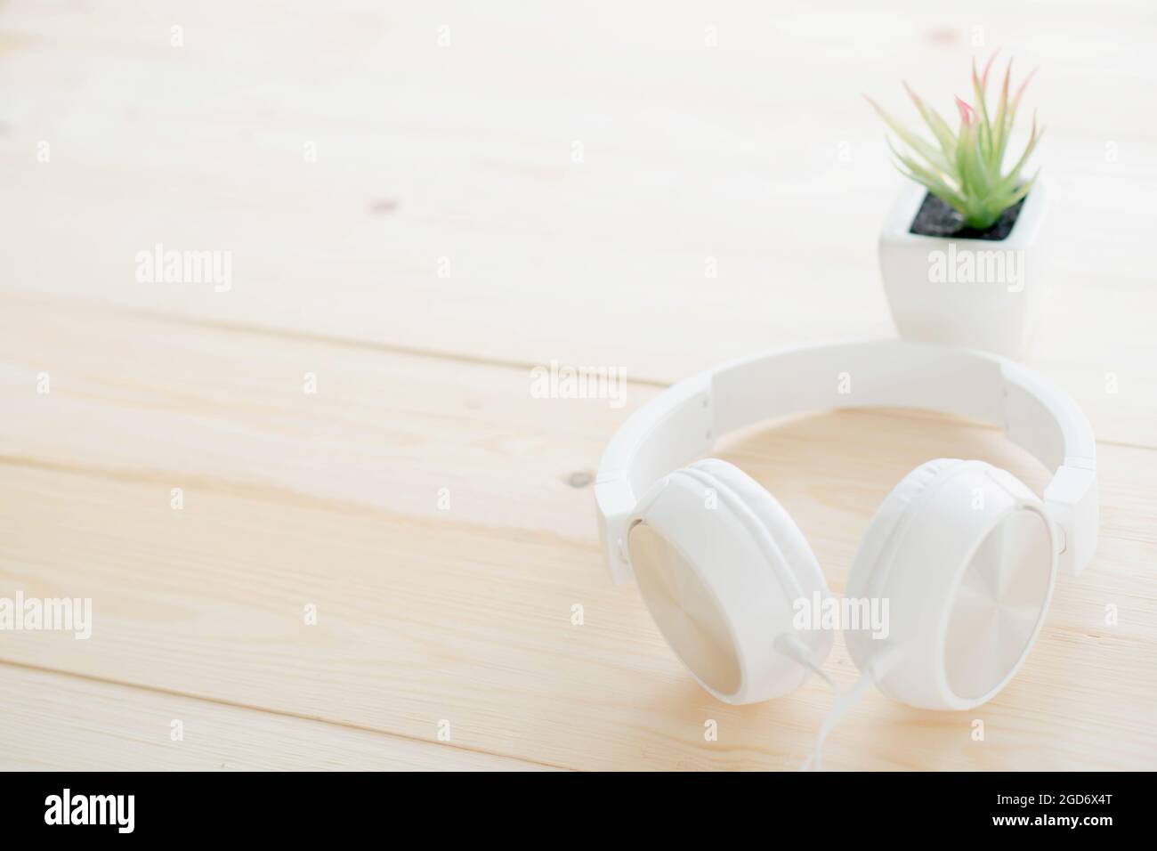 Headphones on the table. Relax concept Stock Photo - Alamy