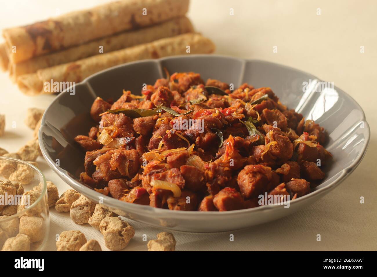 Dry roasted soya chunks with onions tomatoes and spices. Prepared with ...