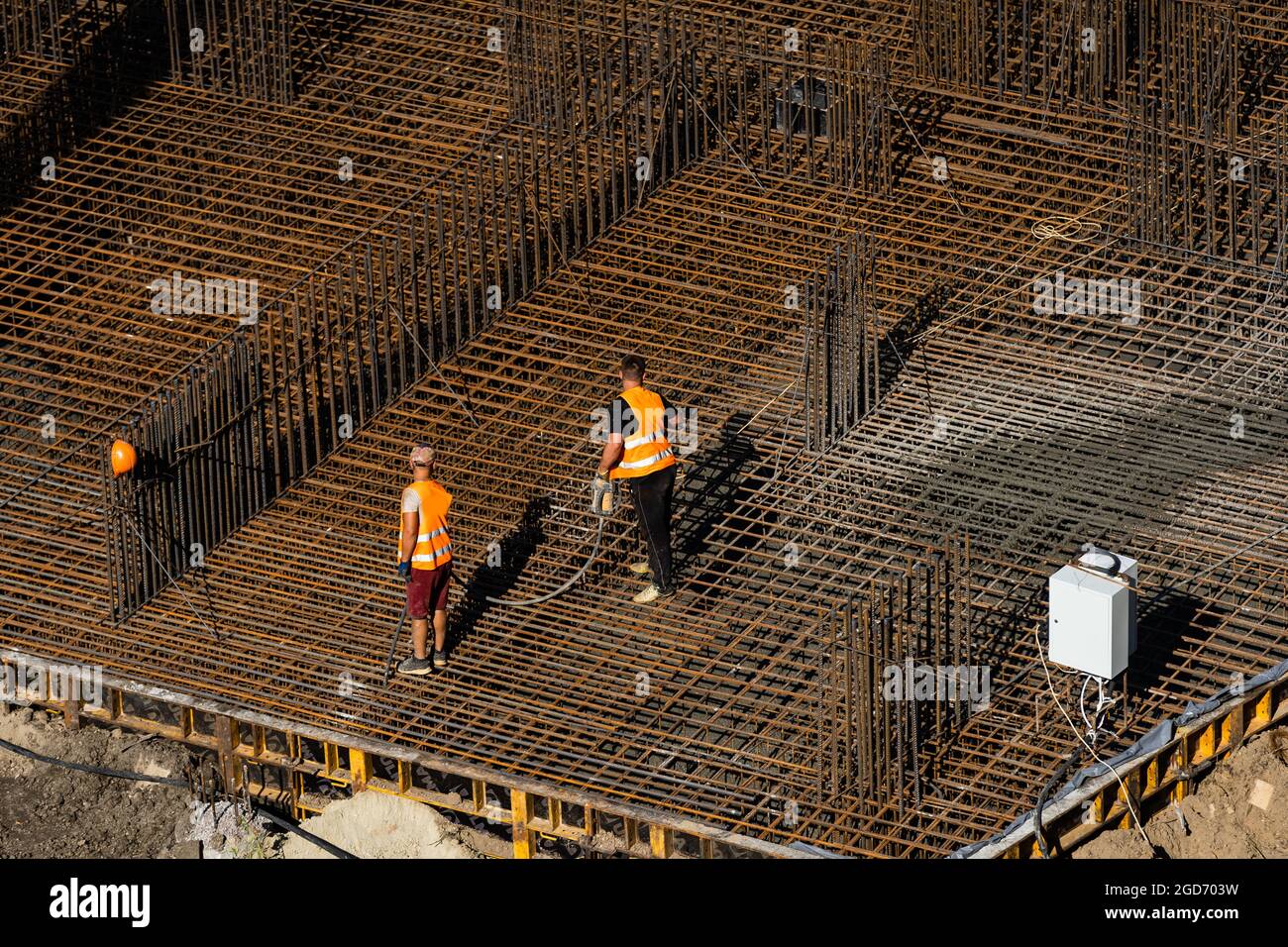 workers make metal reinforcement for the foundation Stock Photo - Alamy