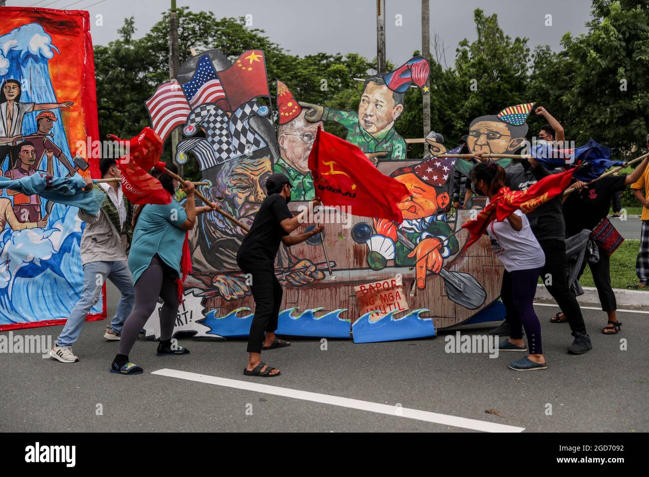 Protesters destroy an effigy of President Rodrigo Duterte ahead of ...