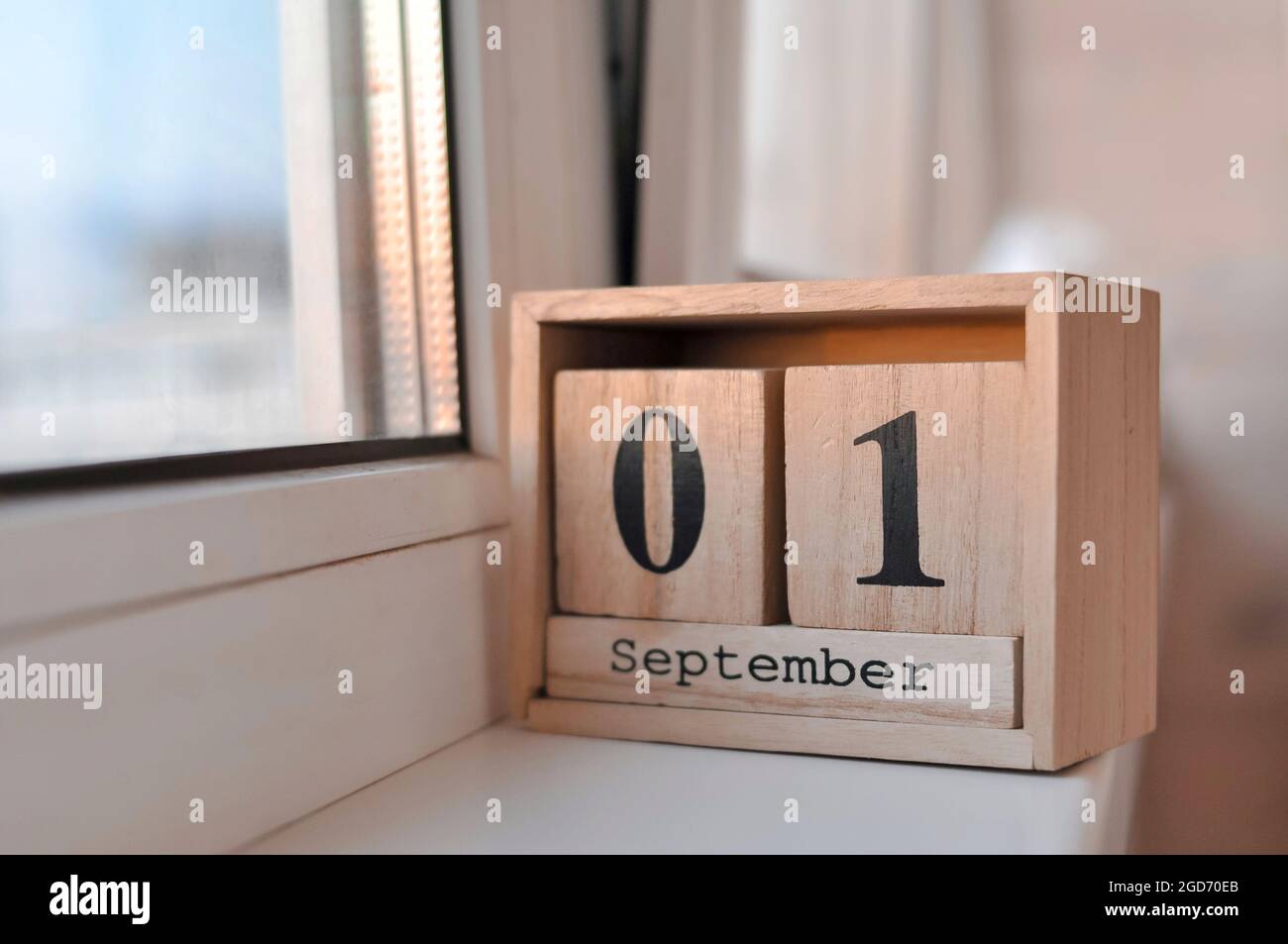 wooden calendar with numbers 1st september on the table at home Stock ...
