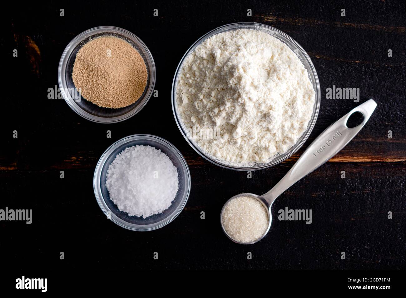 French Bread Ingredients on a Wood Table: Flour, yeast, sugar, and salt ...