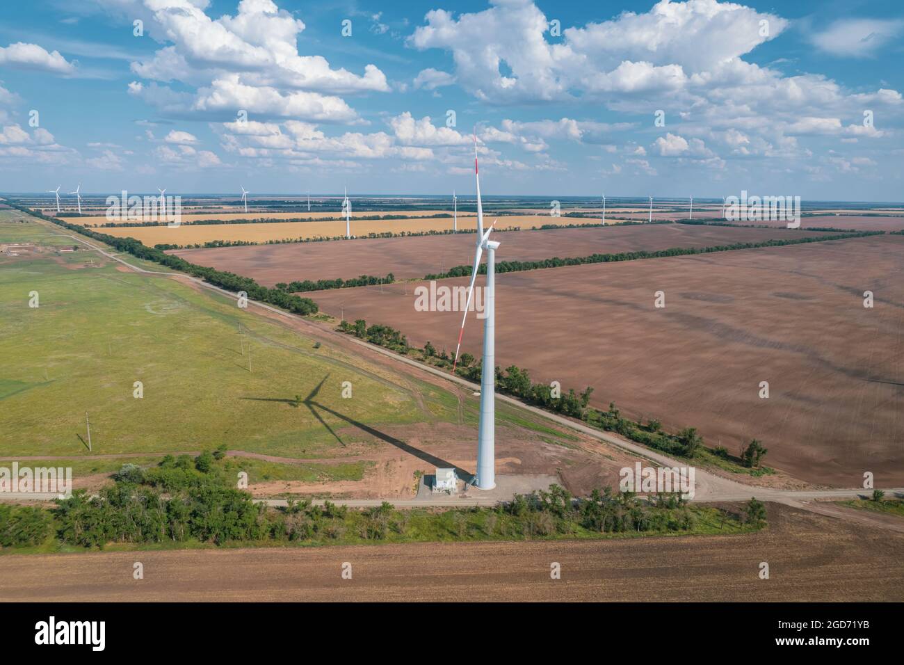Wind farms consist of many individual wind turbines, which are ...