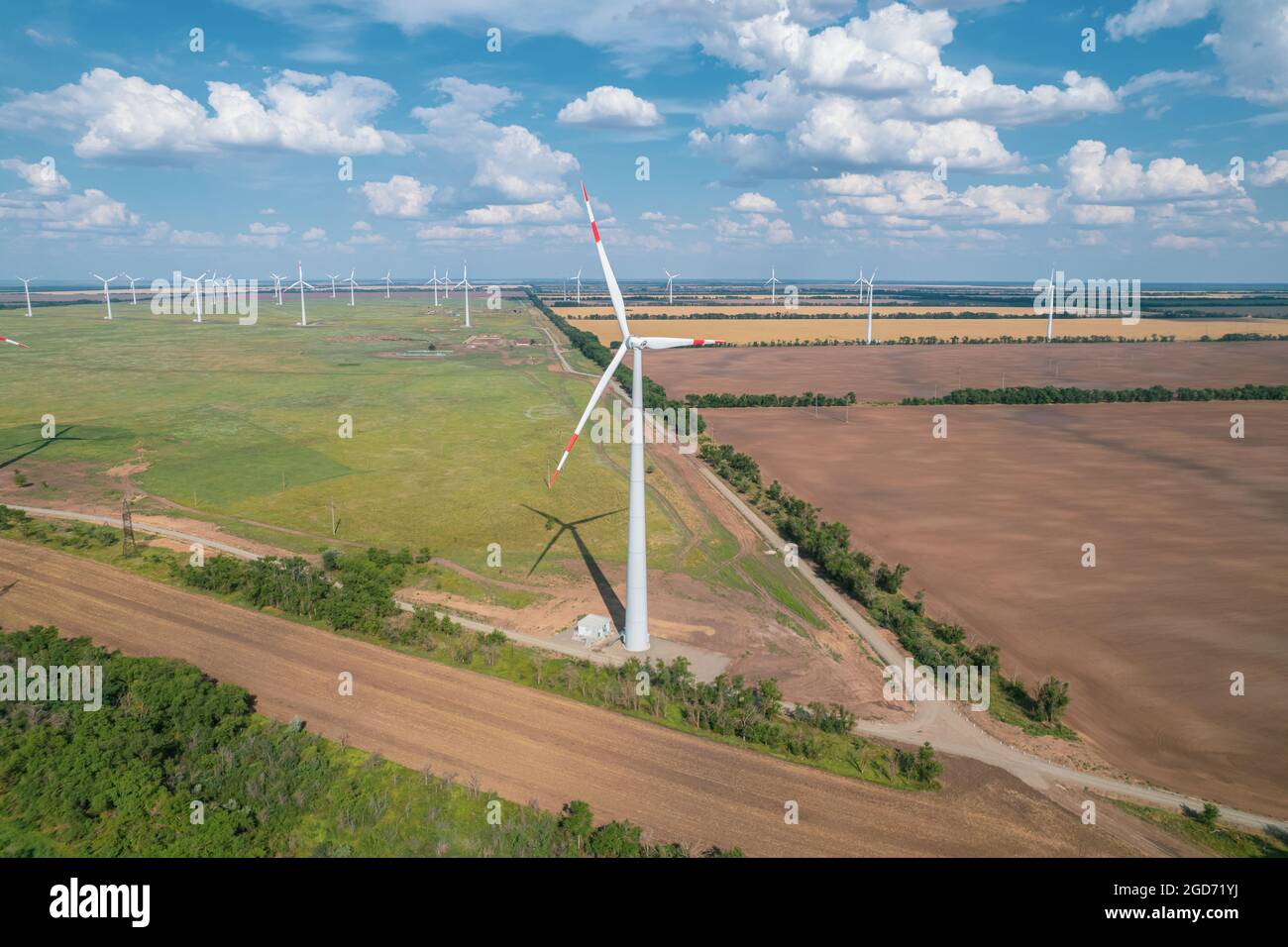 Wind farms consist of many individual wind turbines, which are ...