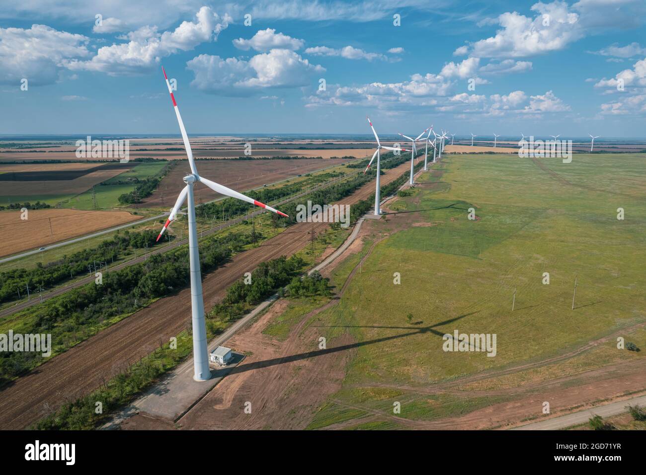 Wind farms consist of many individual wind turbines, which are ...