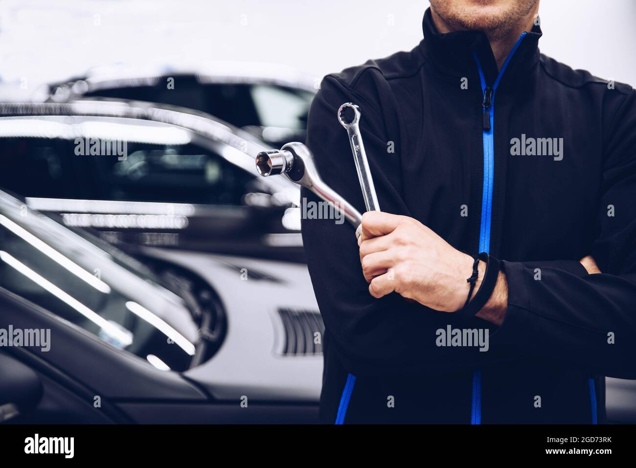 Car mechanic holding wrench hi-res stock photography and images - Alamy