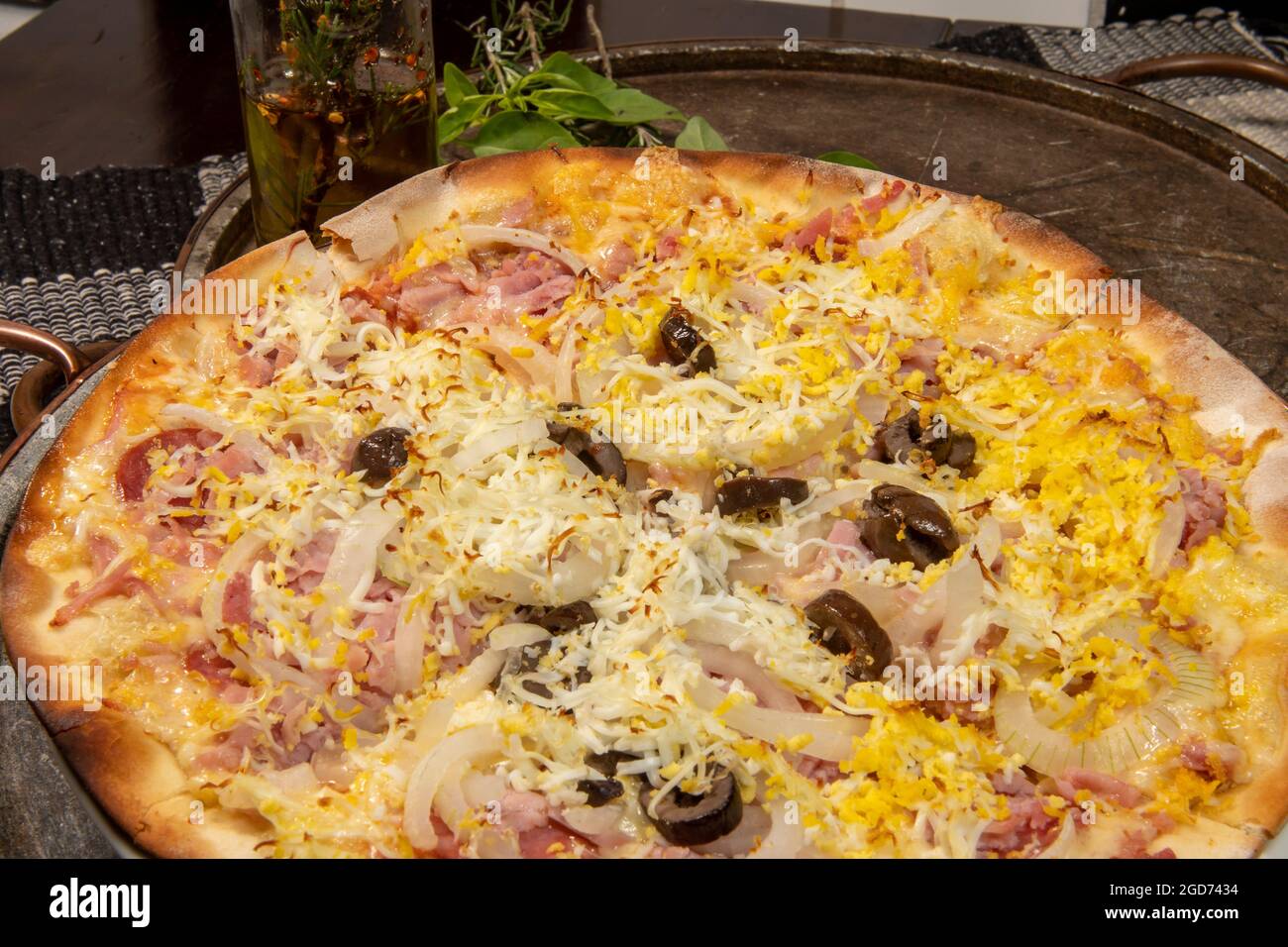 Brazilian Portuguese-style pizza with ham, egg, pepper, onion ...