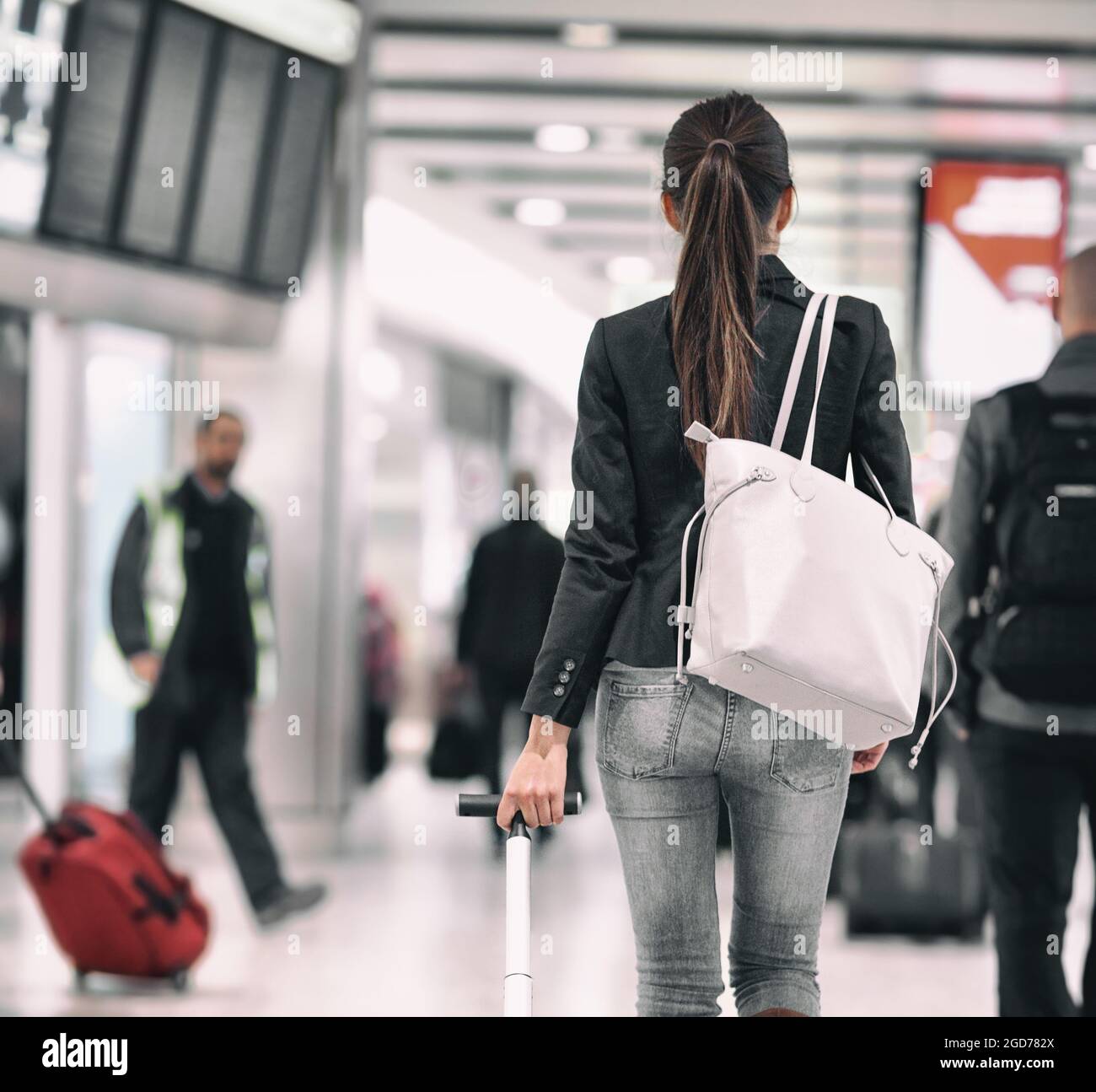 Travel background airport terminal passengers walking in lounge. Asian ...