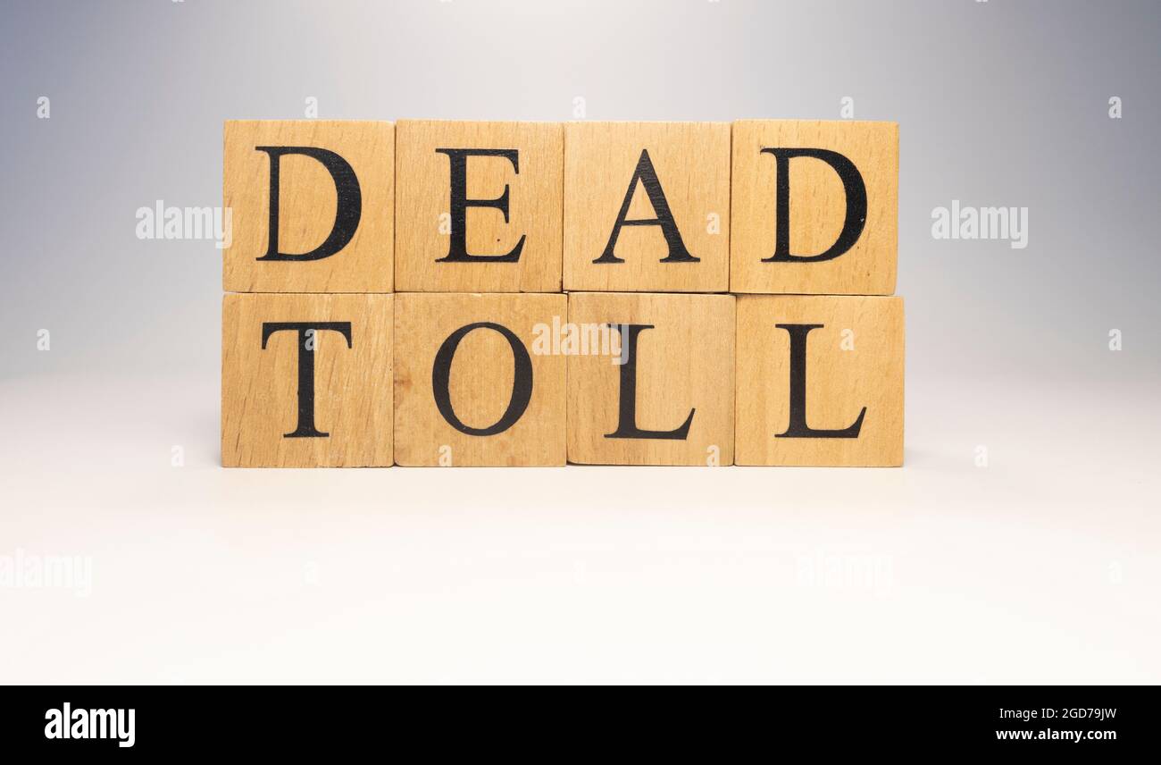 Dead toll was created from wooden cubes. News and journalism concepts ...