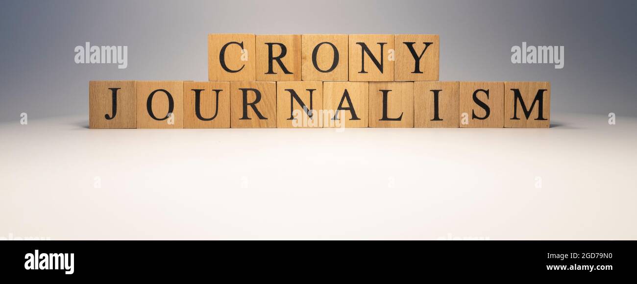 Crony Journalism was created from wooden cubes. News and journalism ...
