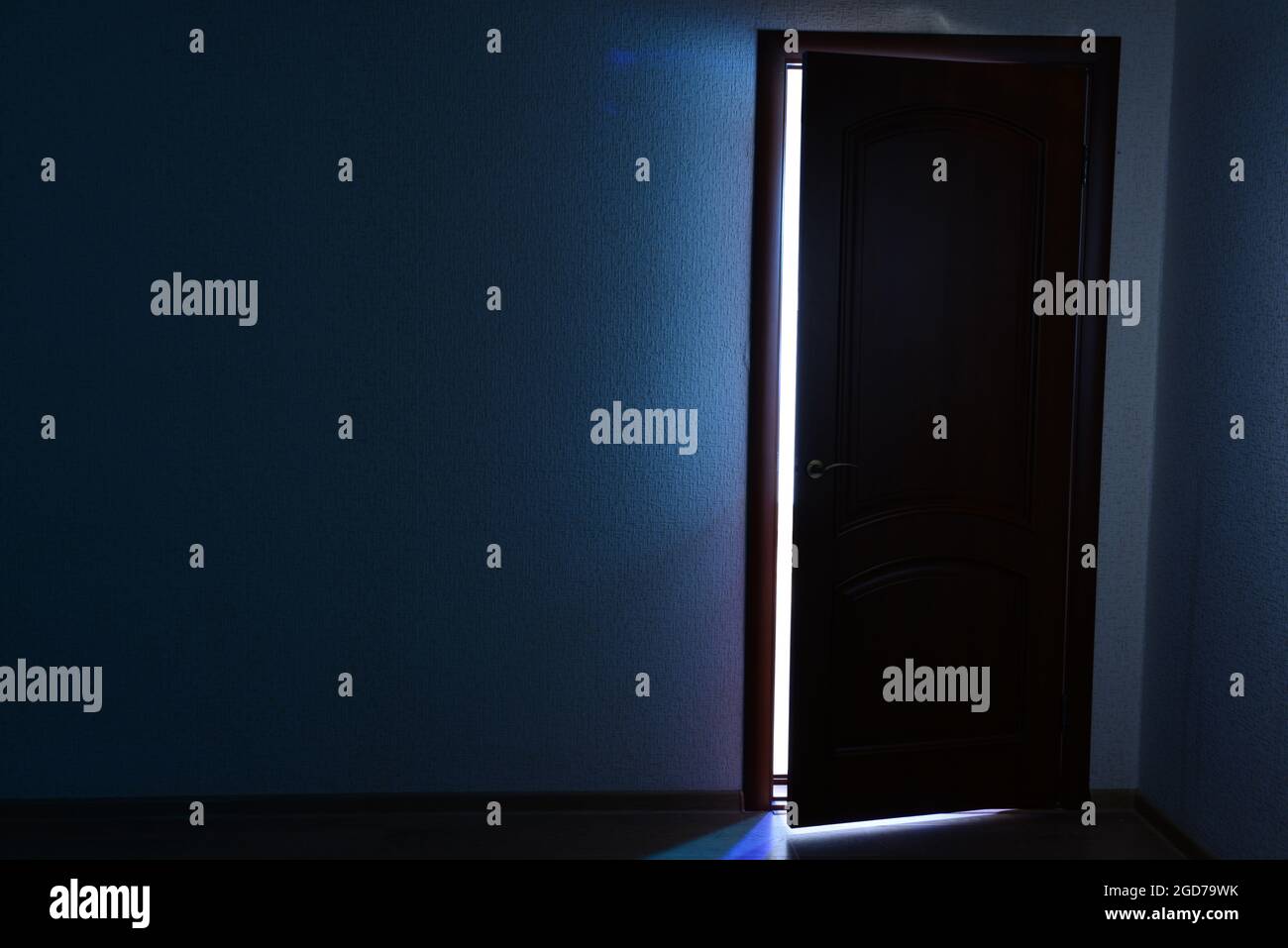 Open door with bright light outside Stock Photo - Alamy