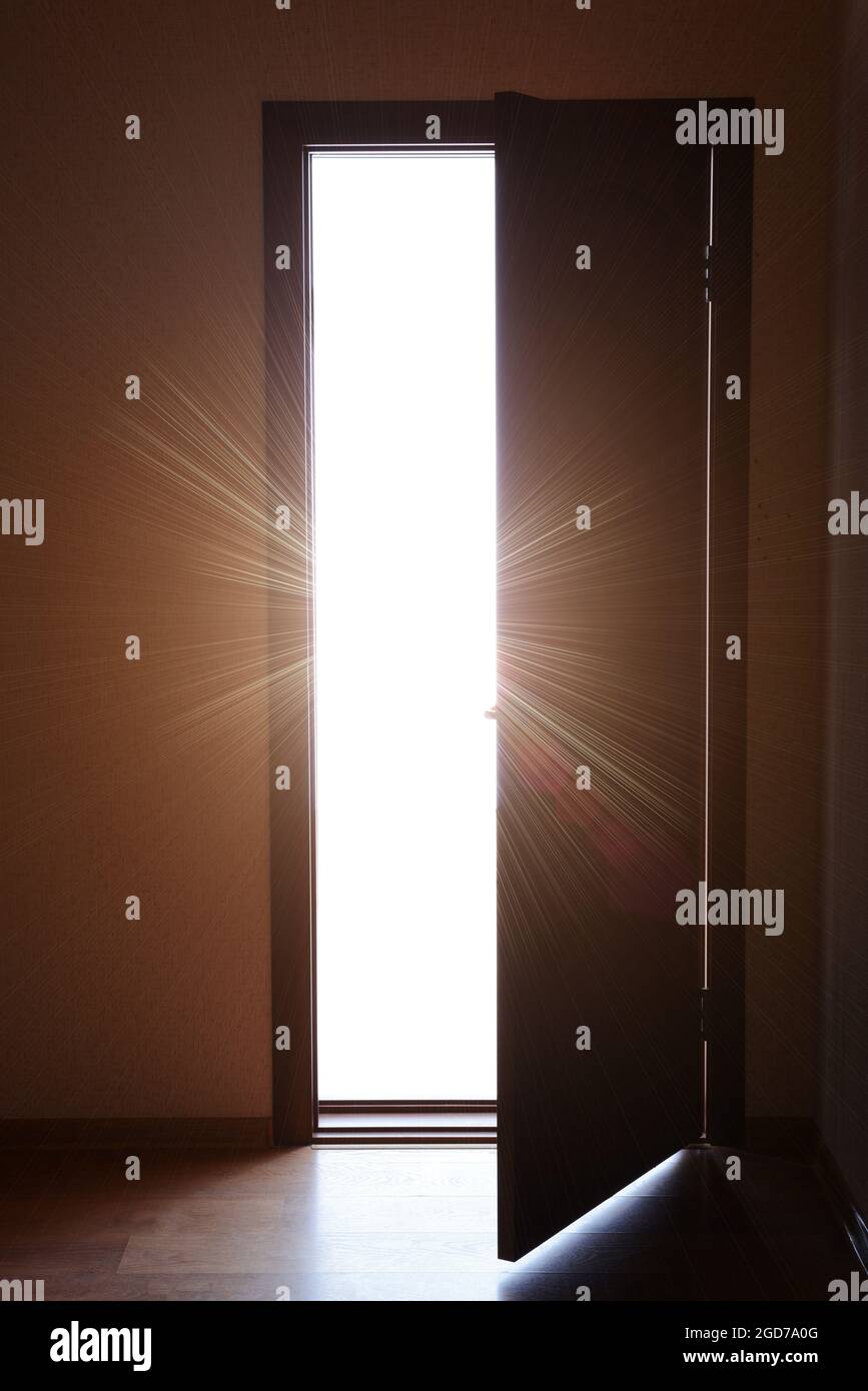 Open door with bright light outside Stock Photo - Alamy