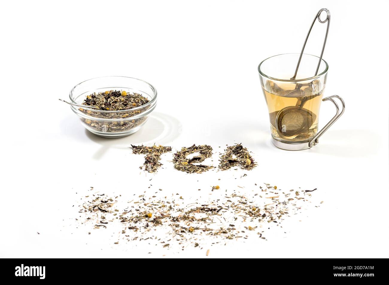 Tea text made by tea leaf on wwhite background surface with a bowl of ...