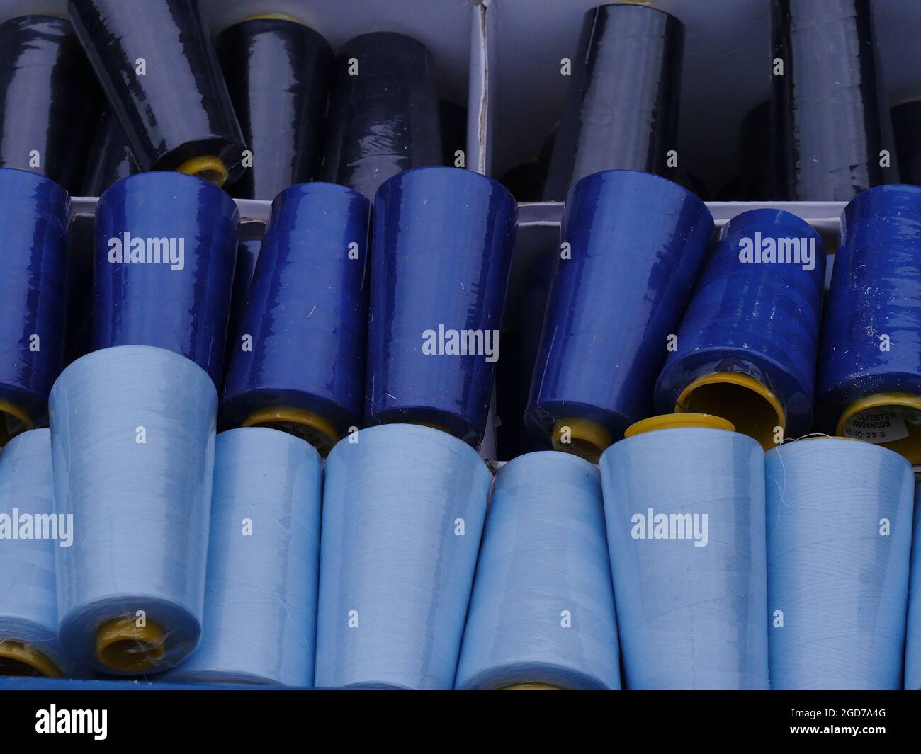 Gran rolls, partly covered with dust, in shades from light blue to dark ...