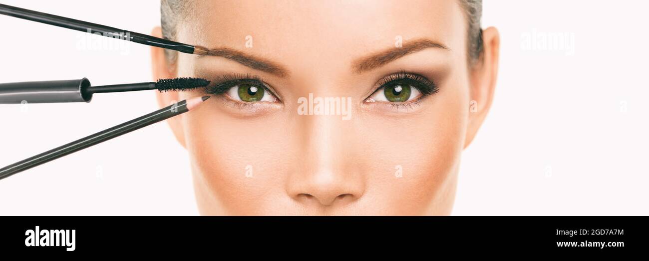 Eye makeup Asian woman professional make up artist applying mascara and ...