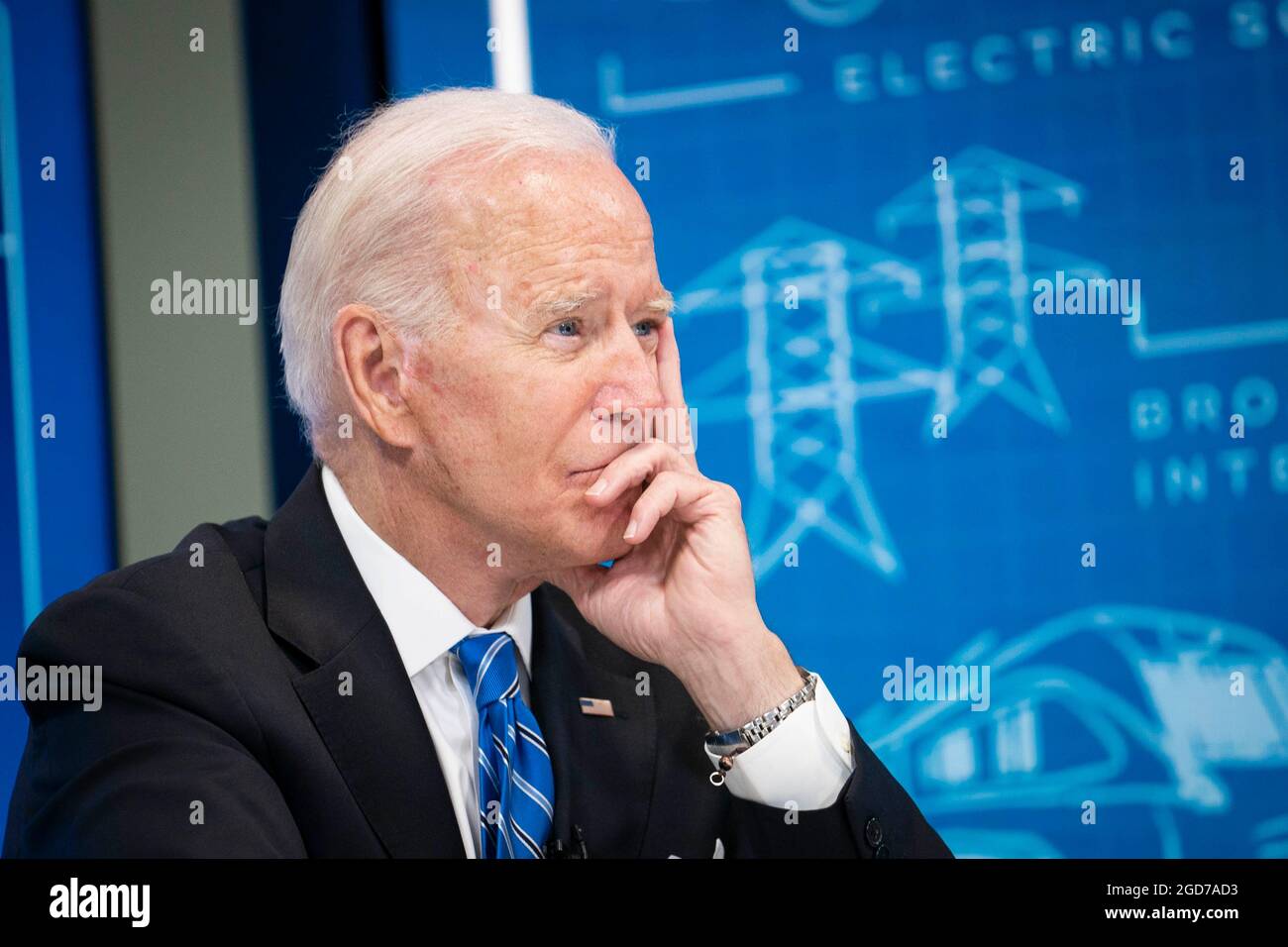 President Joe Biden listens during a virtual meeting with state elected ...