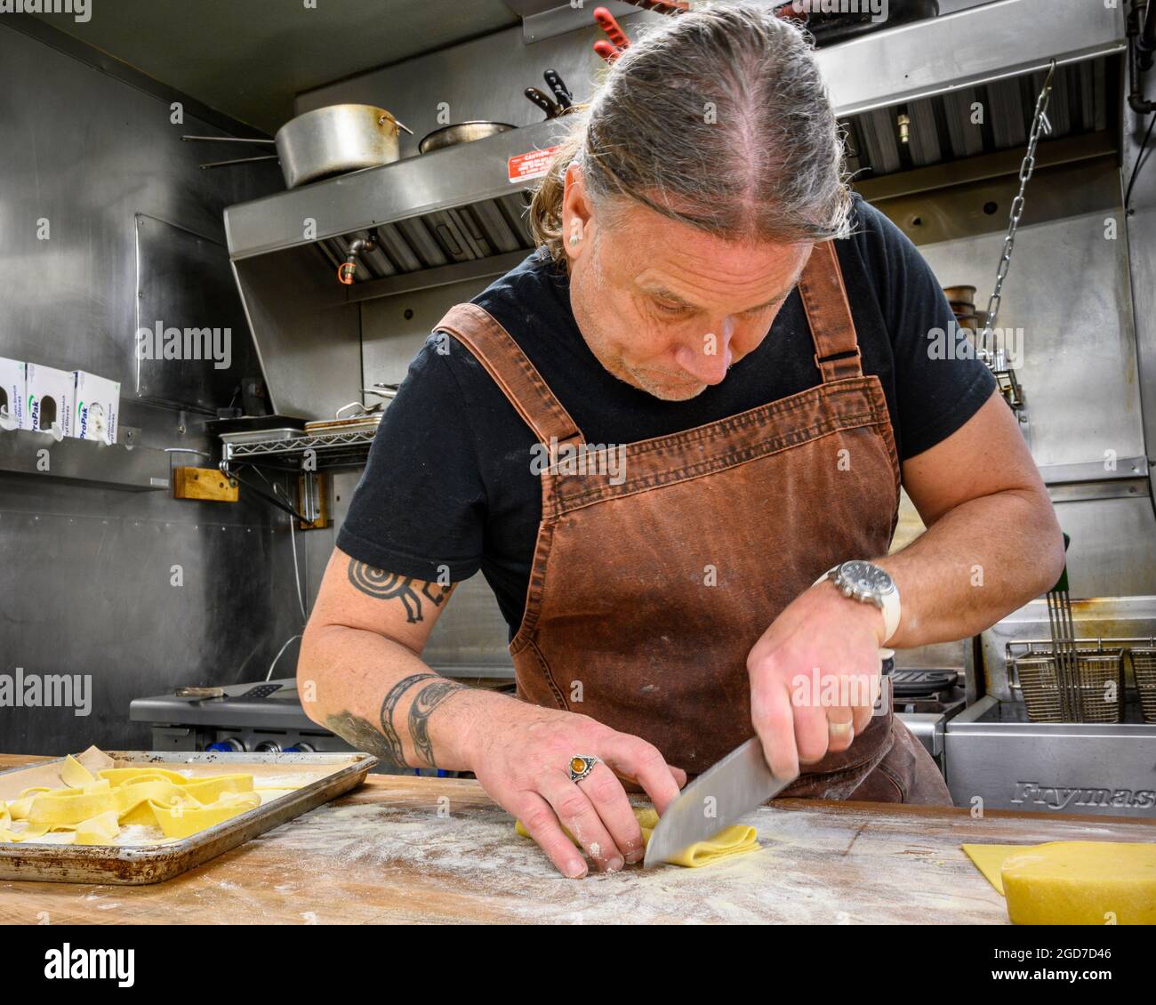 Chef and co-owner Raymond Southern preparing his specialty pasta at ...