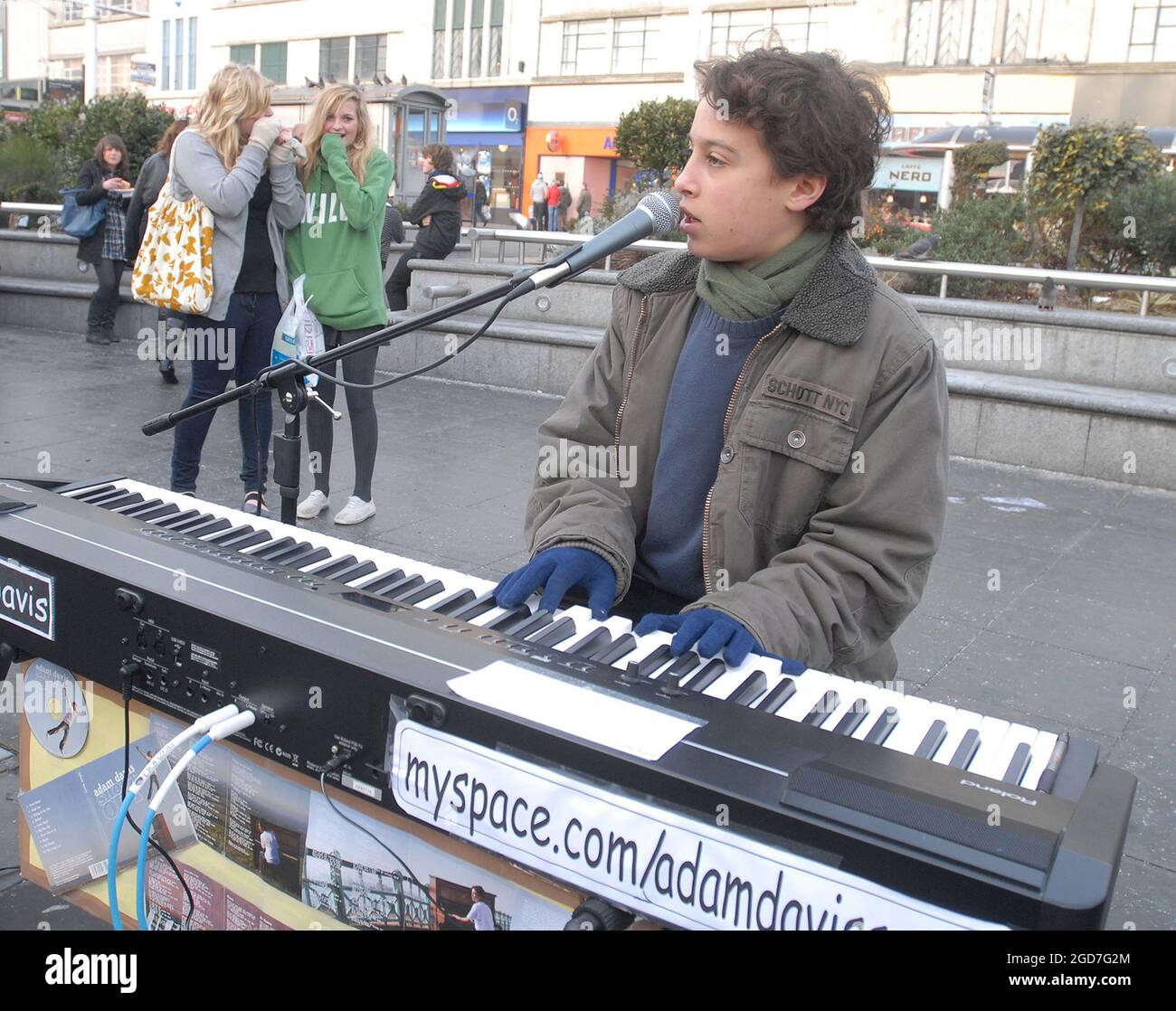 Britains youngest busker Adam Davis performs at Churchill Square in ...