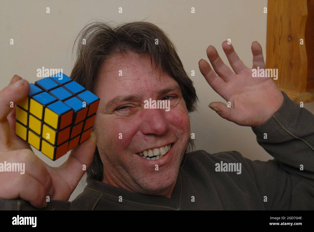 SUCCESS AT LAST. GRAHAM PARKER (45) WITH THE COMPLETED RUBIKS CUBE. PIC ...