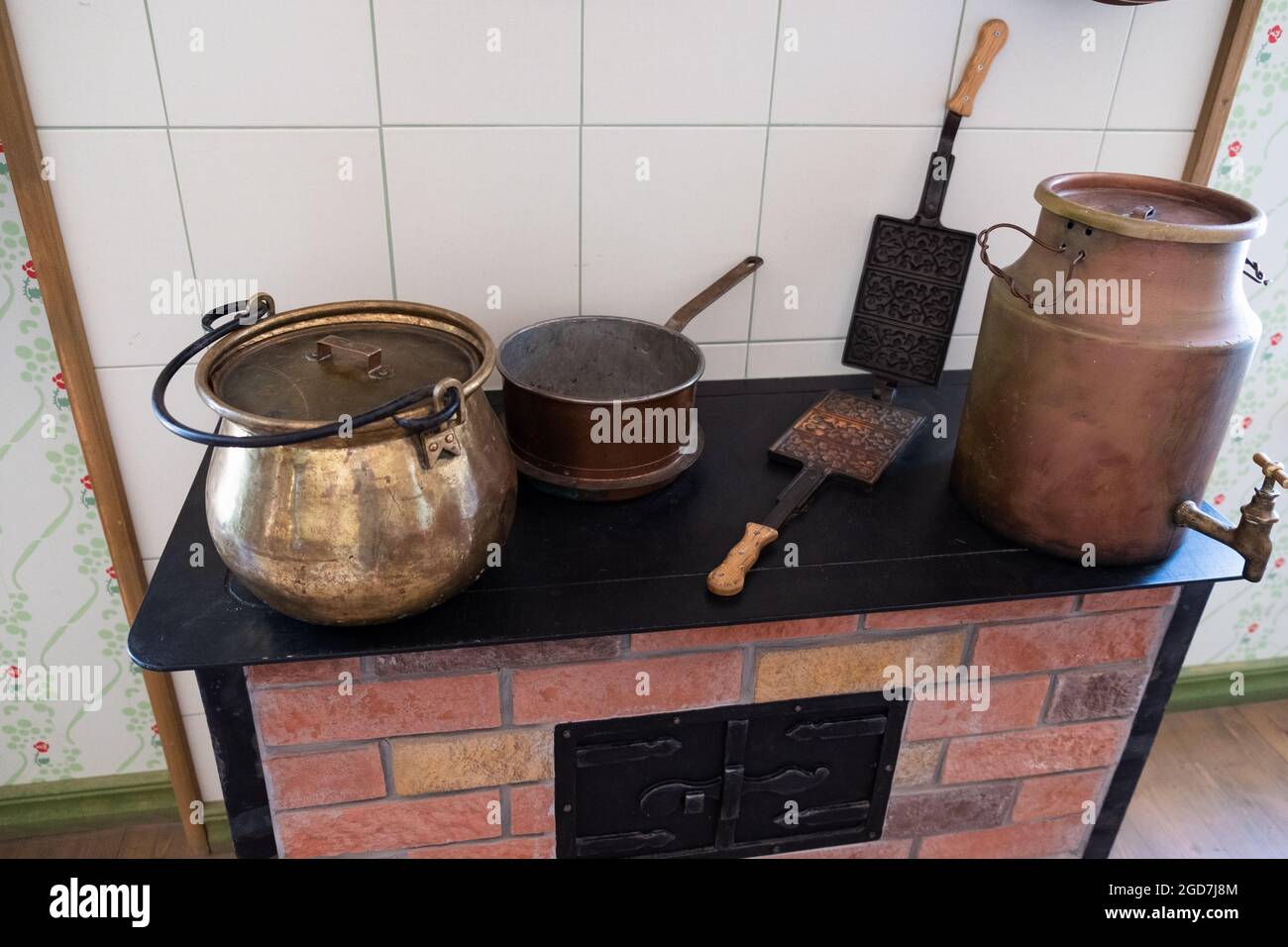 Grandma's cooking. Country style fire wood cooker Stock Photo - Alamy