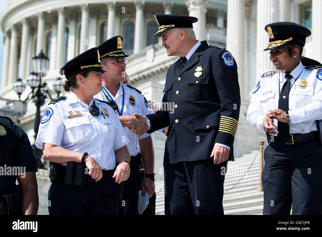 UNITED STATES - JULY 23: J. Thomas Manger, center, new chief of the U.S ...