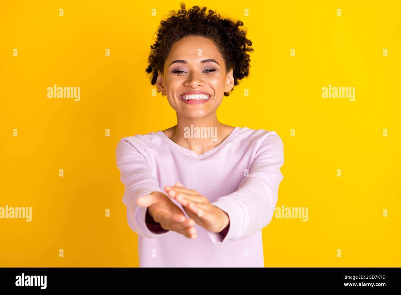 Photo of young happy positive cheerful dark skin woman clap hands you ...