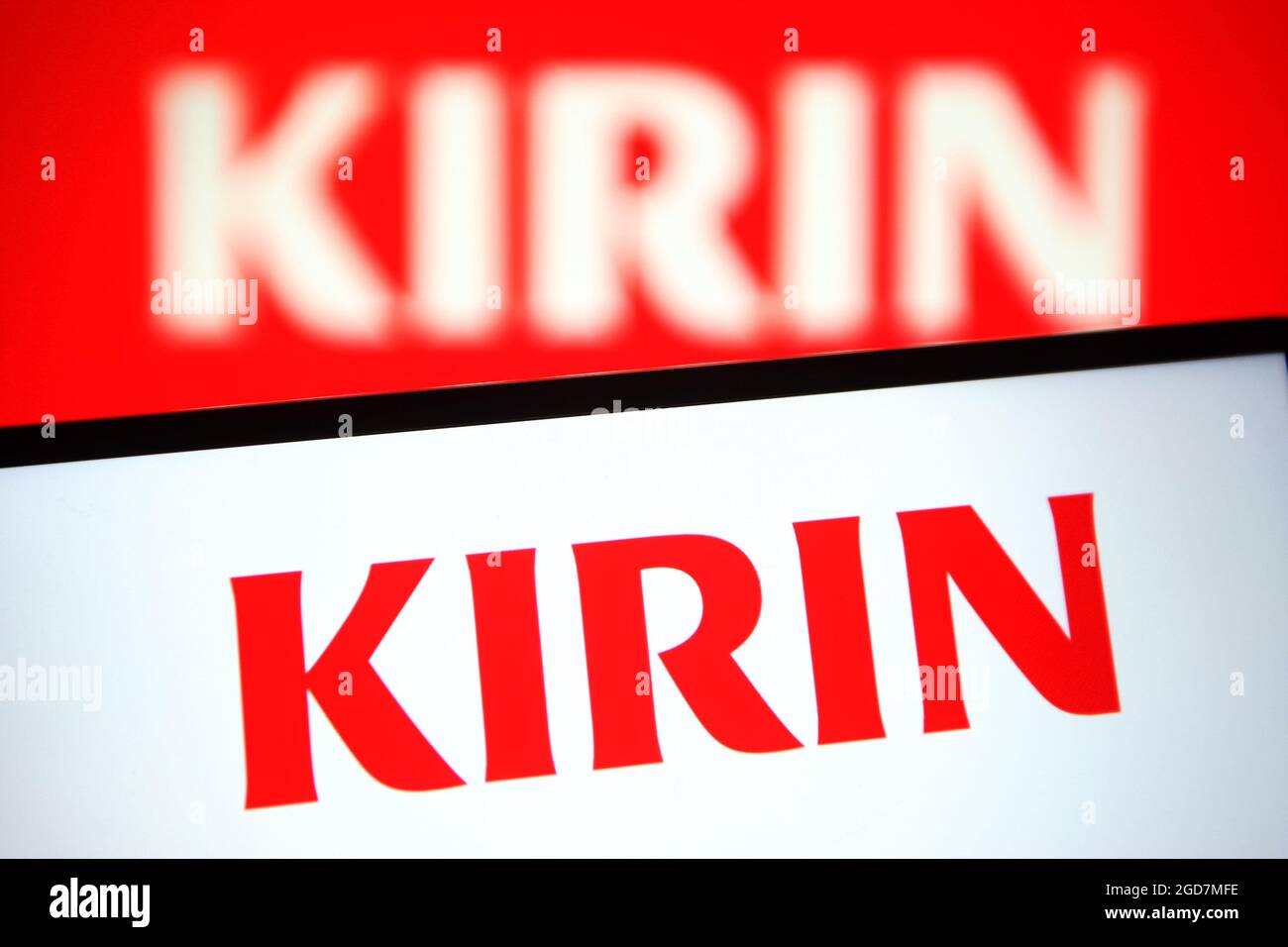 In this photo illustration a Kirin Holdings Company logo is seen on a ...