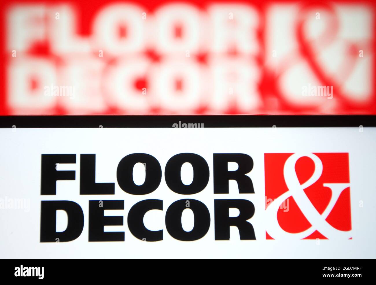In this photo illustration a Floor & Decor Holdings logo is seen on a ...