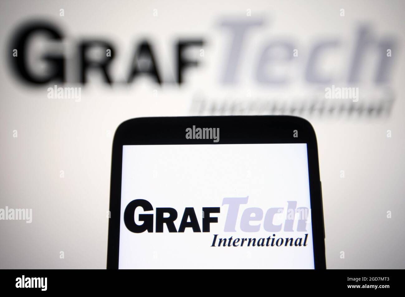 In this photo illustration a GrafTech International logo is seen on a ...