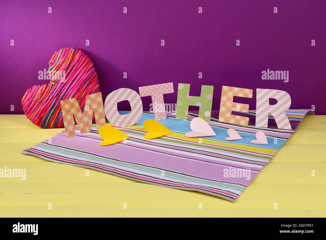 Mother- lettering of handmade paper letters on purple background Stock ...