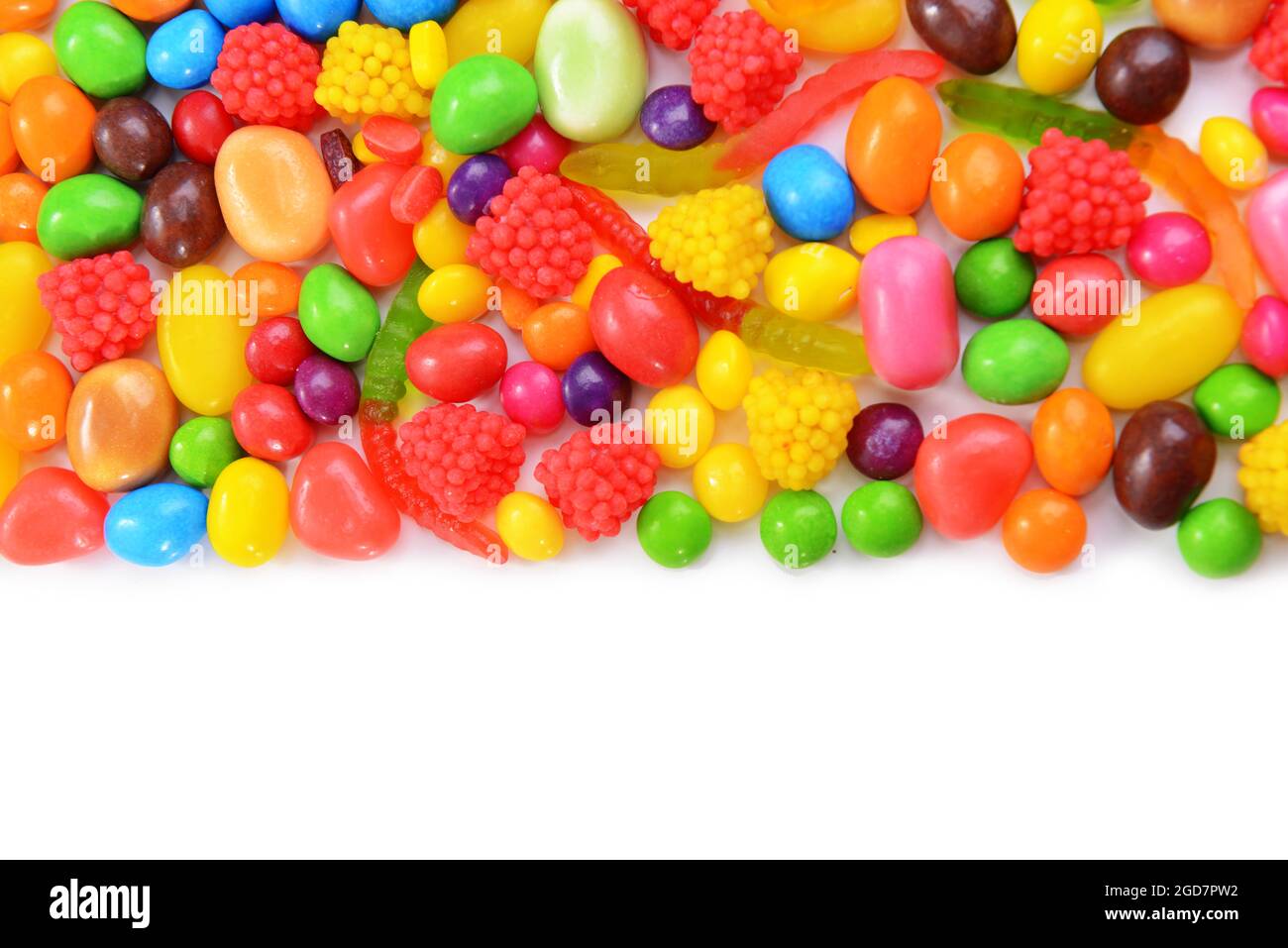Different colorful fruit candy close-up Stock Photo - Alamy