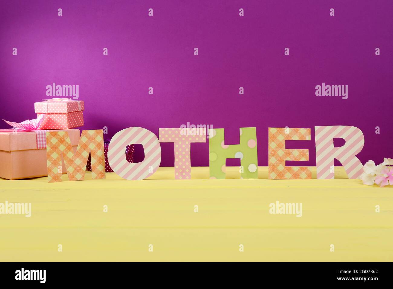 Mother- lettering of handmade paper letters on purple background Stock ...