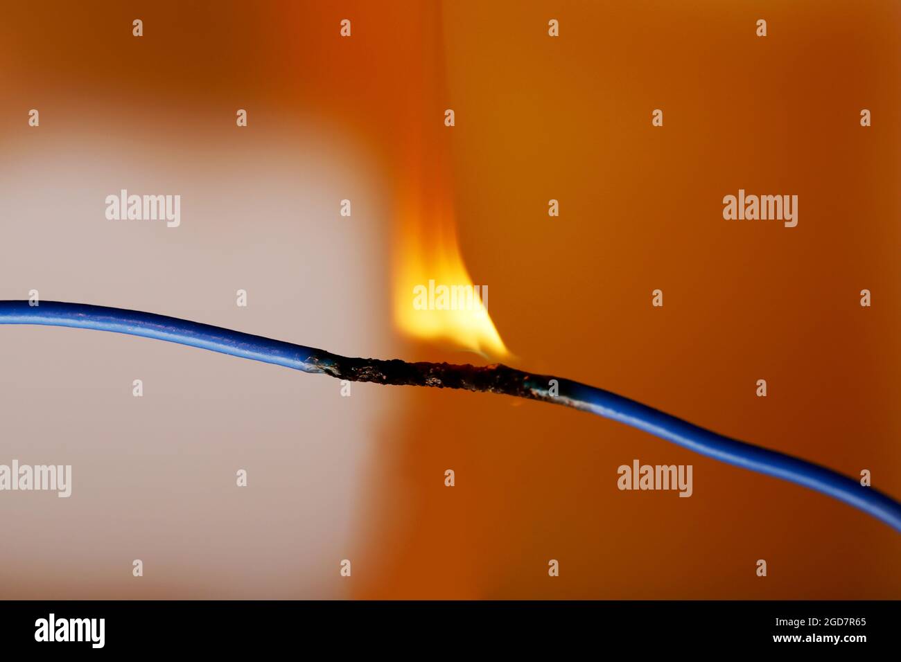 Short circuit, burnt cable, on dark color background Stock Photo - Alamy