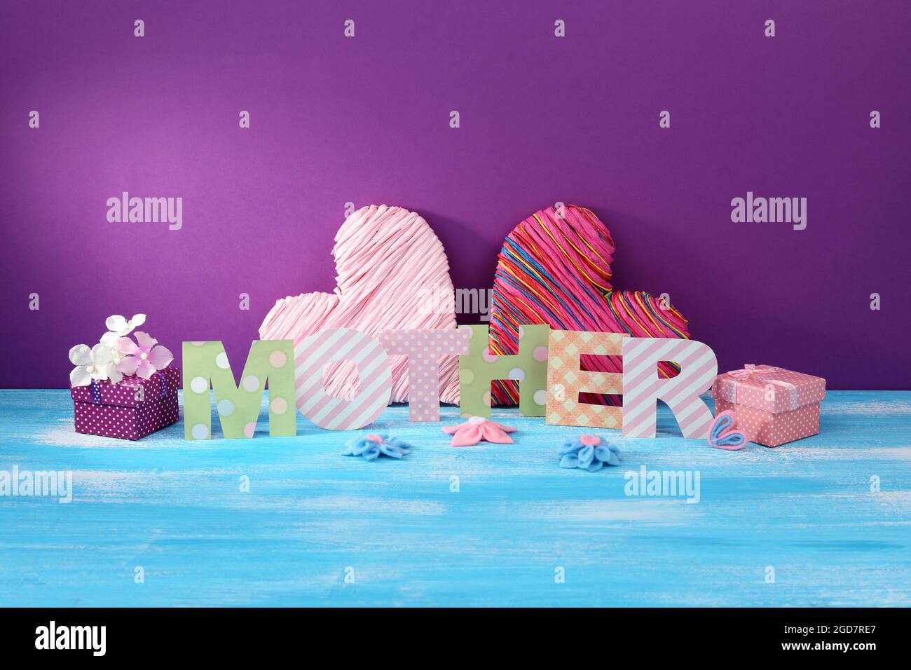 Mother- lettering of handmade paper letters on purple background Stock ...