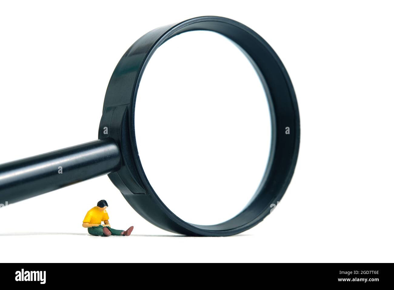 Boy reading a book with magnifier Cut Out Stock Images & Pictures - Alamy