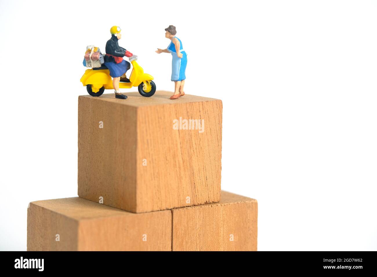 Miniature people toys conceptual photography. Post parcel package ...