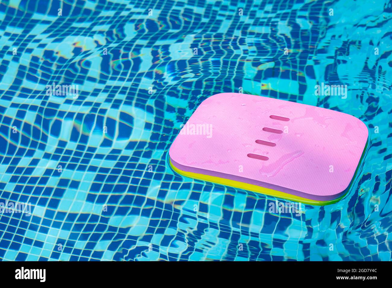 floating pad on the water of a swimming pool Stock Photo - Alamy