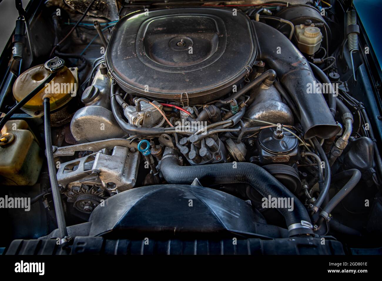 Engine of a classic car from late 70's with first fuel injection system ...