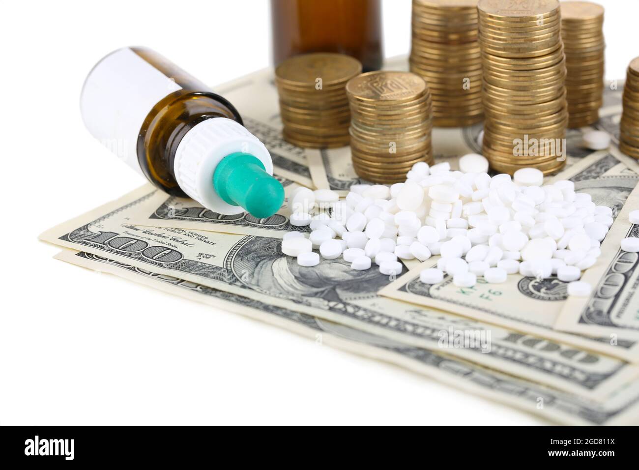 Prescription drugs on money background representing rising health care ...