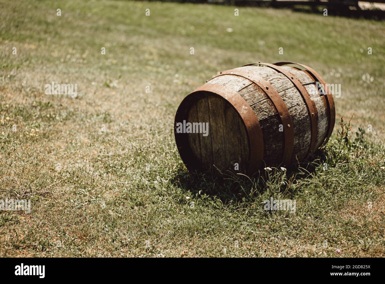 old wooden barrel on the ground Stock Photo - Alamy