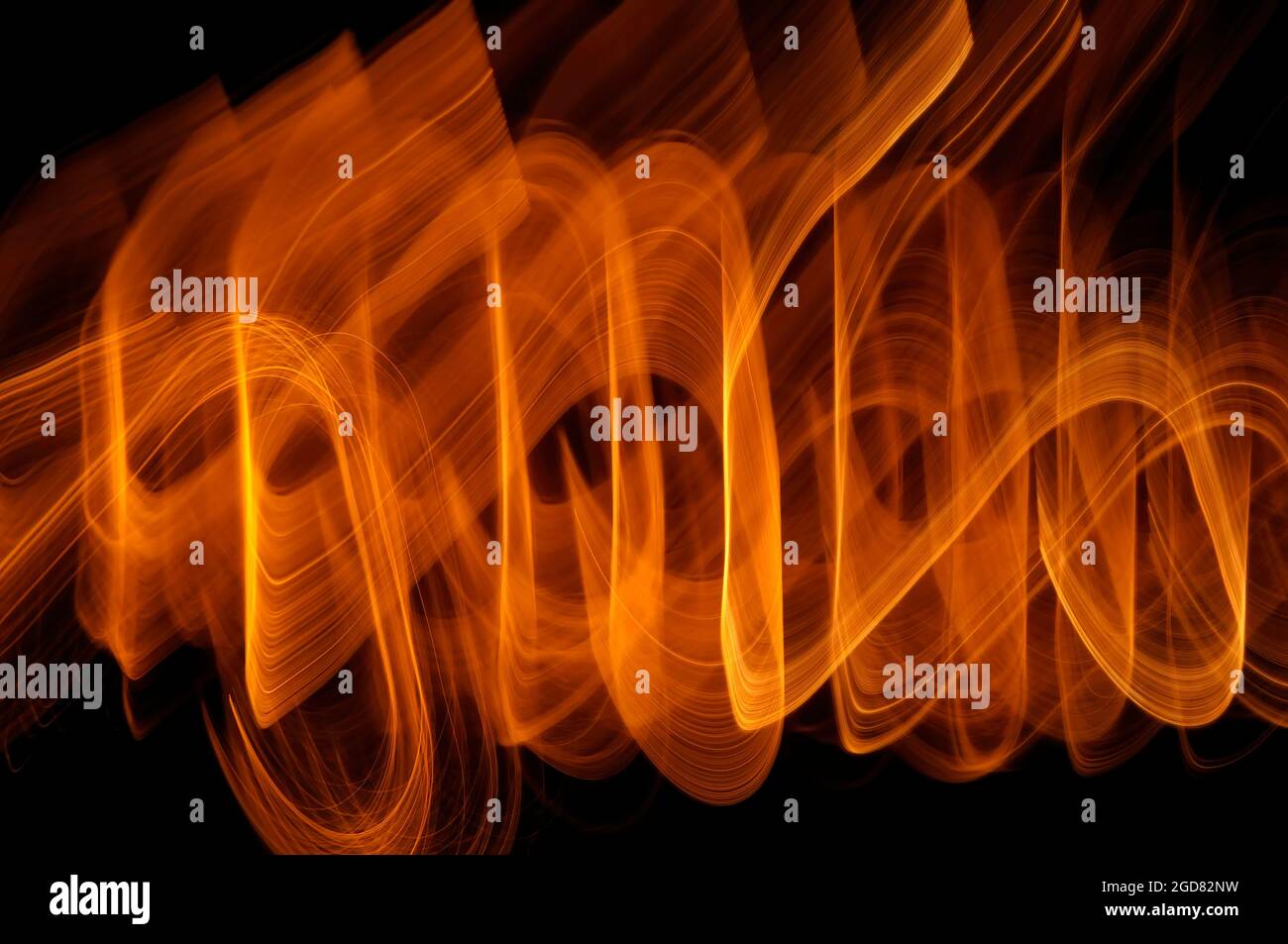Abstract orange light streaks paint Stock Photo - Alamy