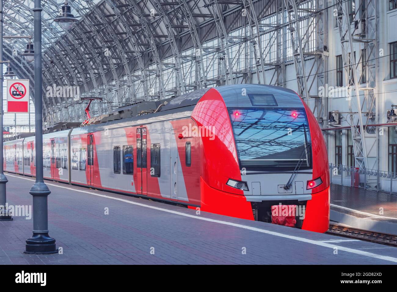 Highspeed train stands by the platform at morning time Stock Photo - Alamy