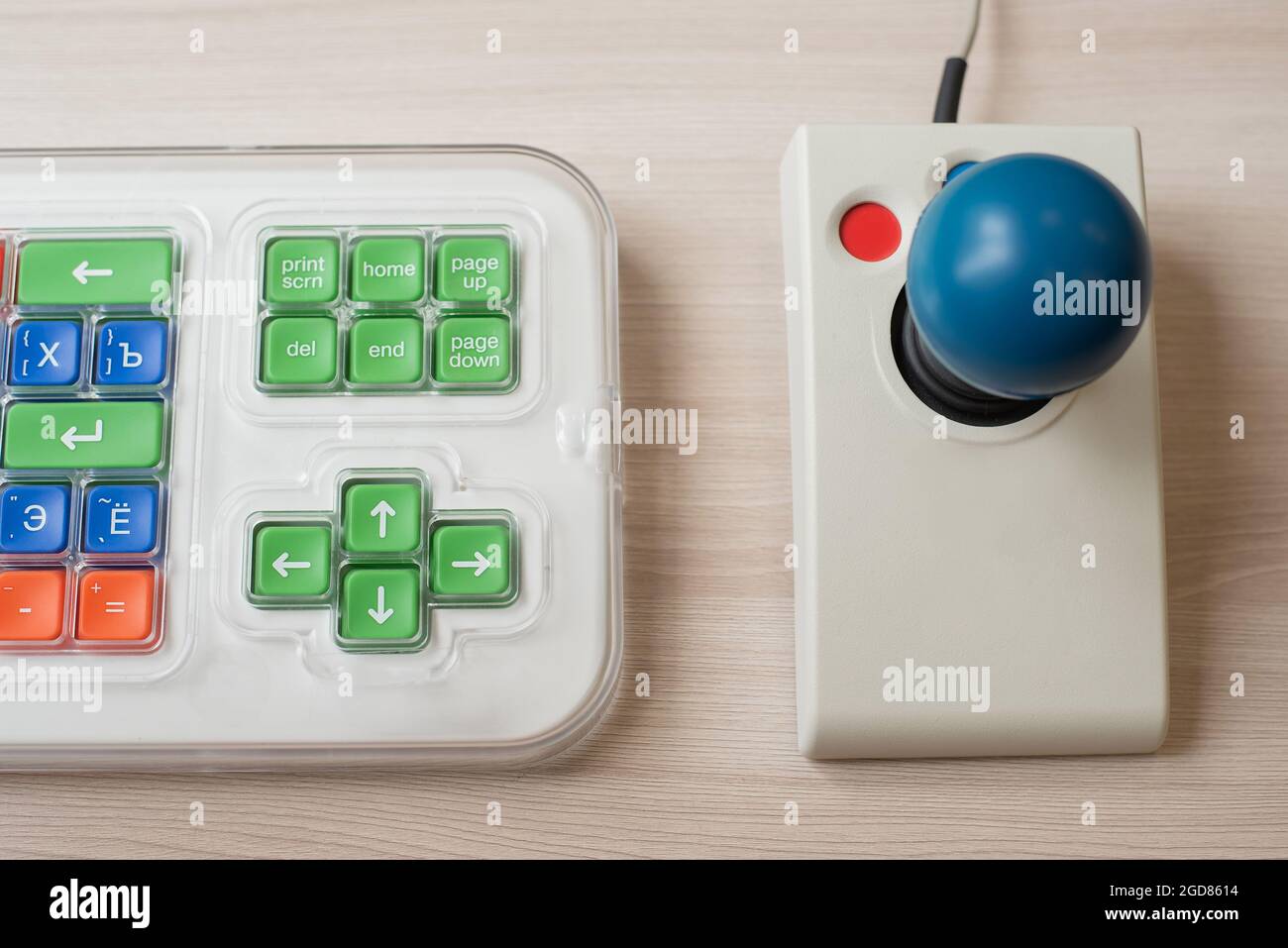 Close-up of a specialized computer mouse and keyboard for people with ...