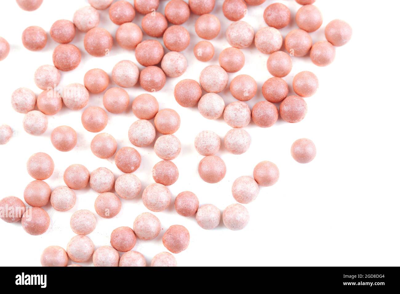 Powder balls isolated on white Stock Photo - Alamy