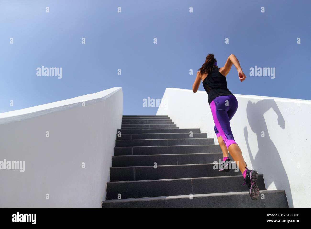 Stairs running workout woman training cardio at gym. Fitness girl ...